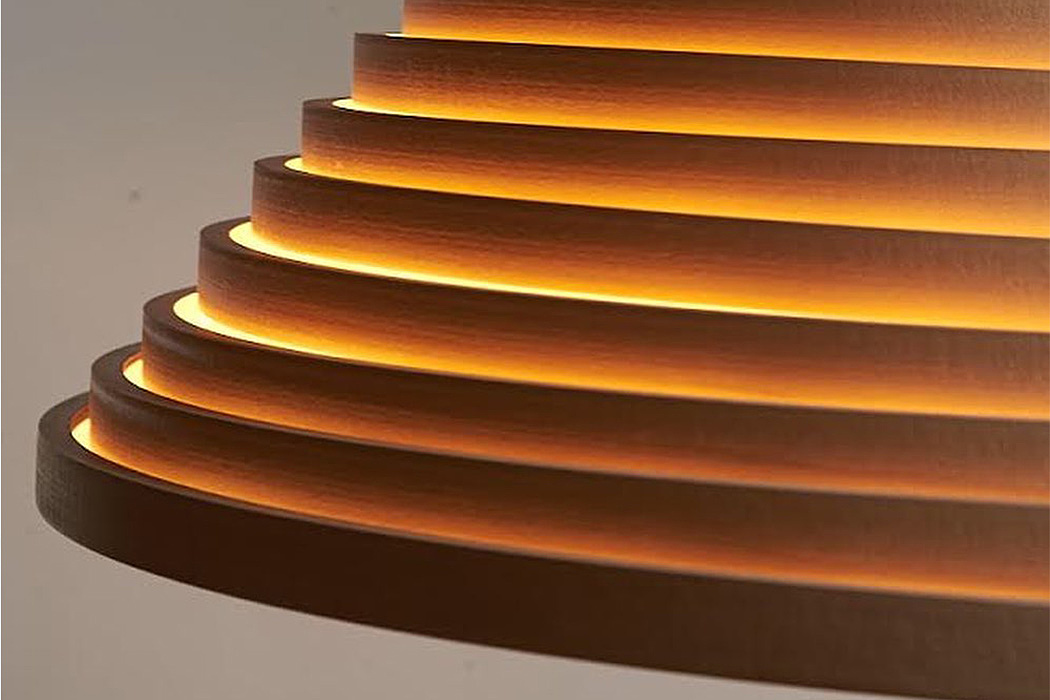 This flatpack origami-inspired product unfolds into a layered lamp for ...